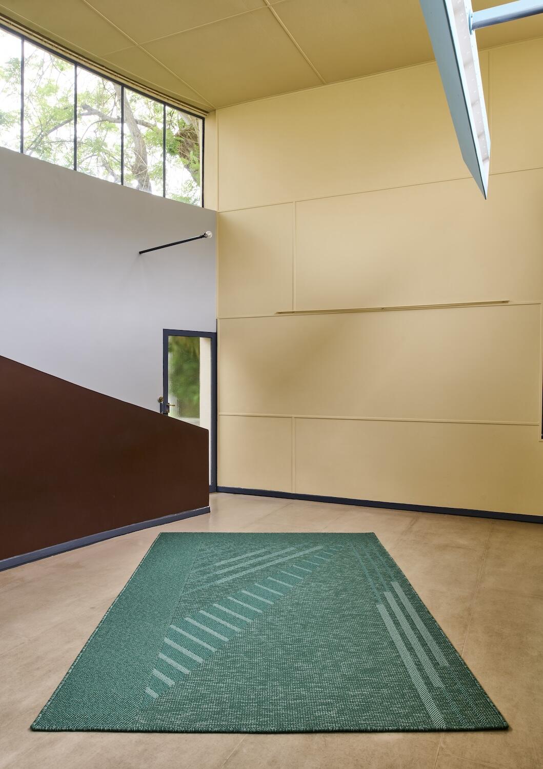 This Parisian textile artist’s handmade rugs are a study in color